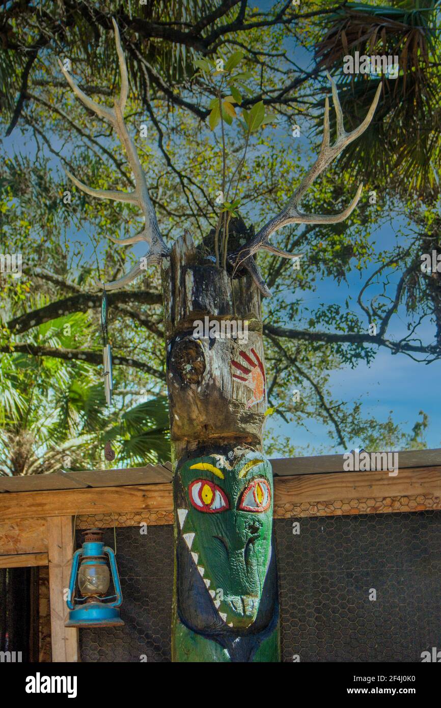 A stylized totem pole outside the entrance to the Seminole Tribe of ...