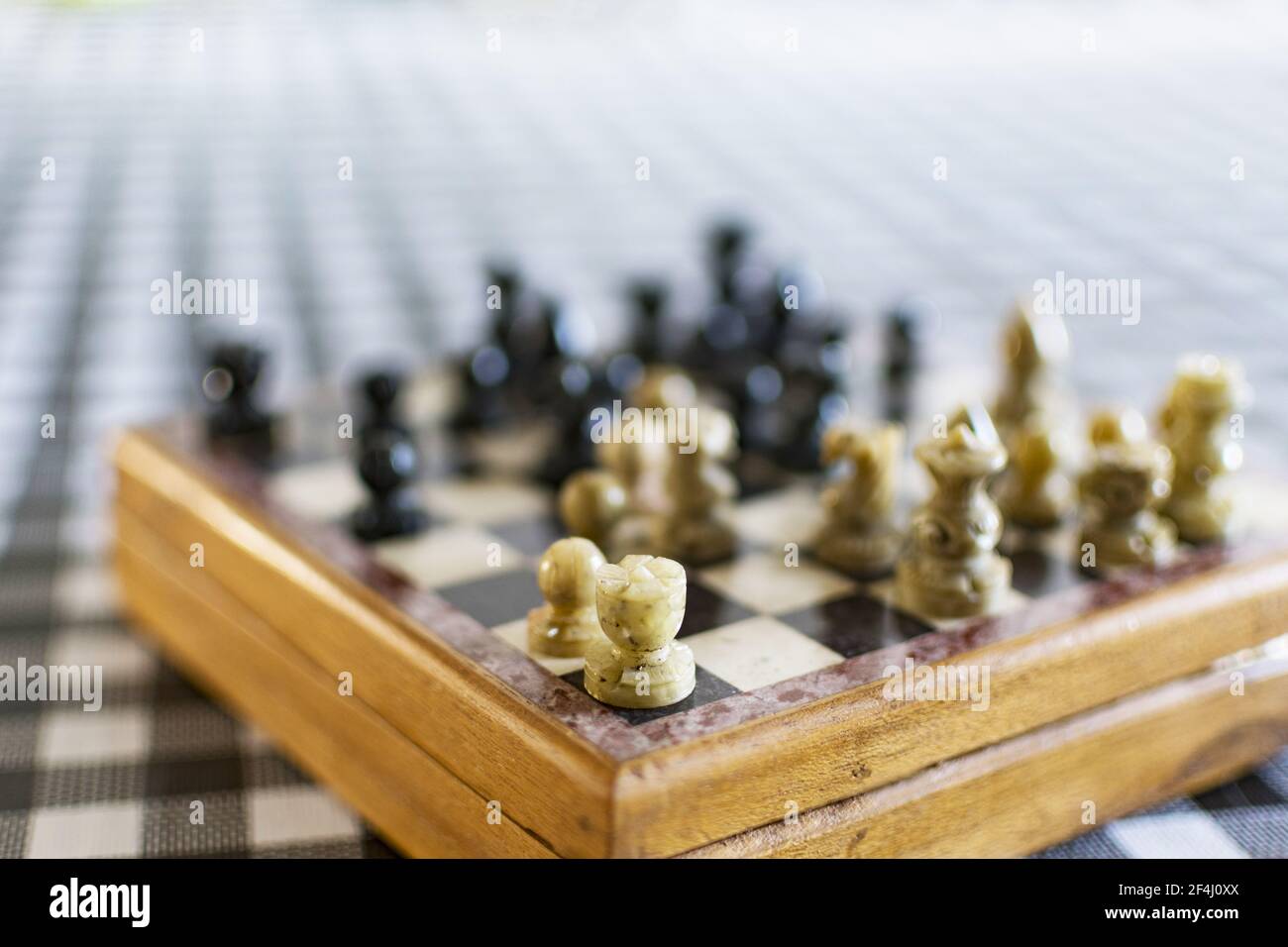 Closeup shot of a chessboard with chess pieces - a board game for logic ...