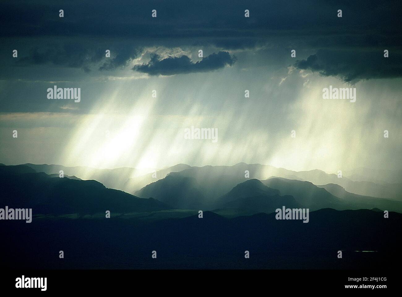 Sunrays through clouds hi-res stock photography and images - Alamy