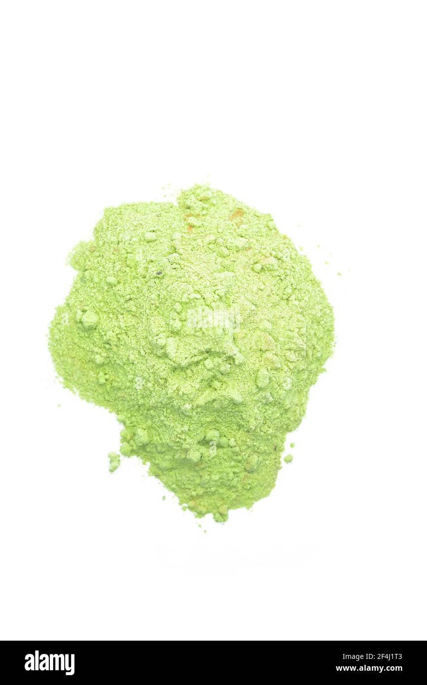 Piles of green color powder for Indian Holi festival on white ...