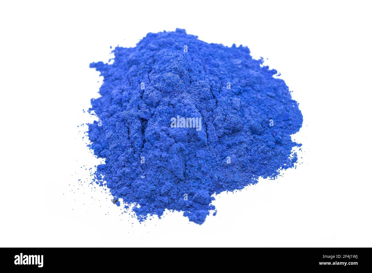 Piles of blue color powder for Indian Holi festival on white background ...