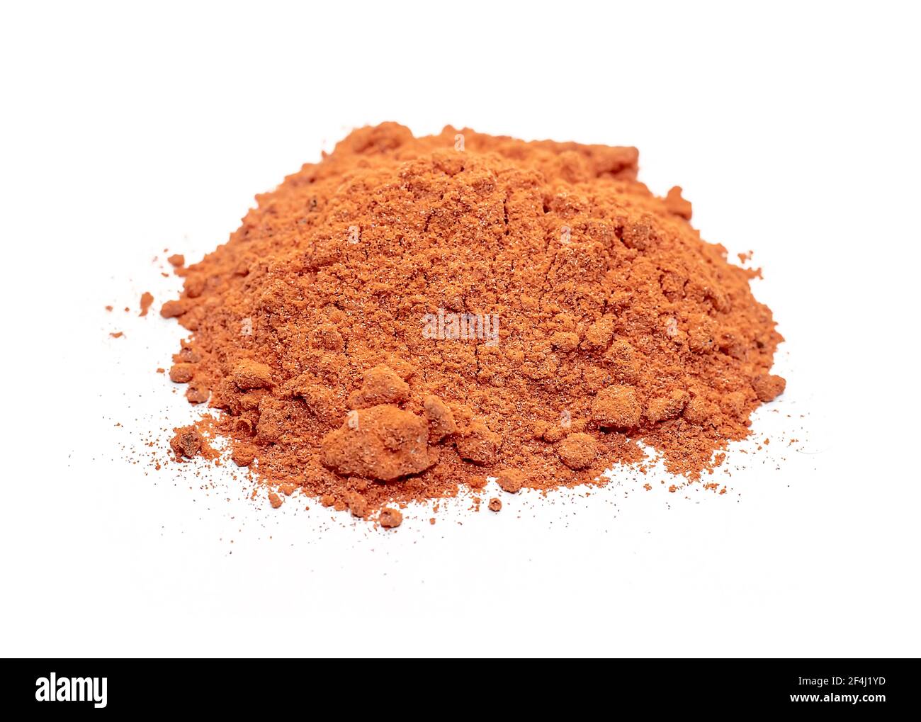 Piles of orange color powder for Indian Holi festival on white ...