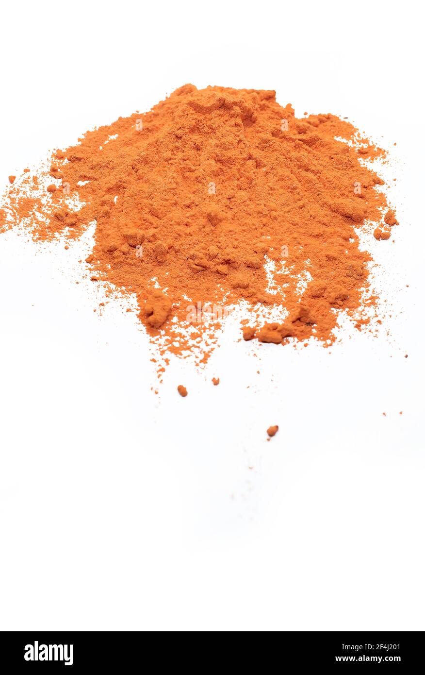 Piles of orange color powder for Indian Holi festival on white ...