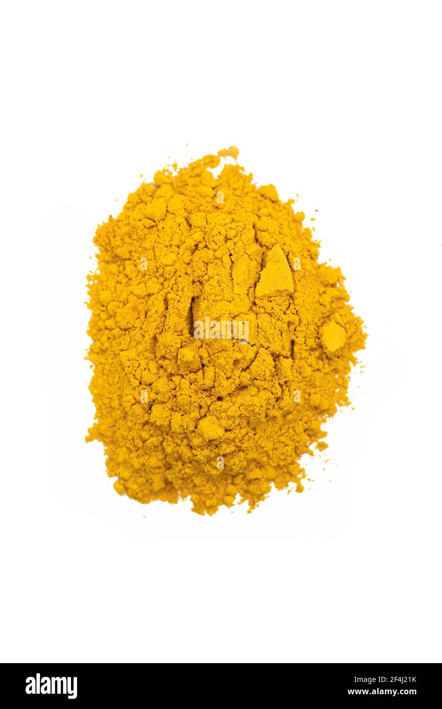 Piles of yellow color powder for Indian Holi festival on white ...