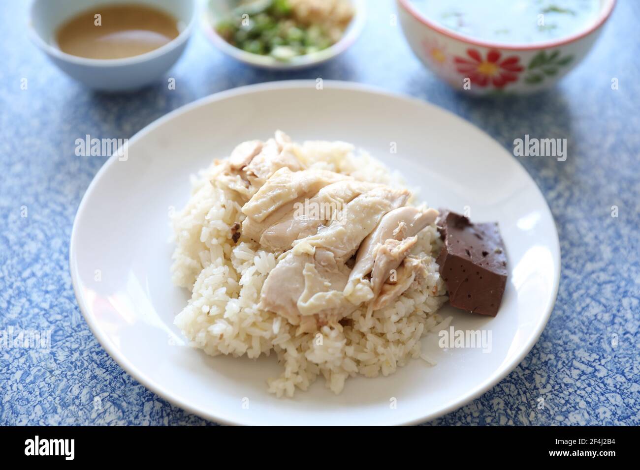 Hainanese chicken rice with cucumber in closeup , Thai food Stock Photo ...