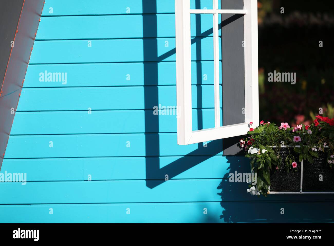 Blue wall with window Stock Photo - Alamy