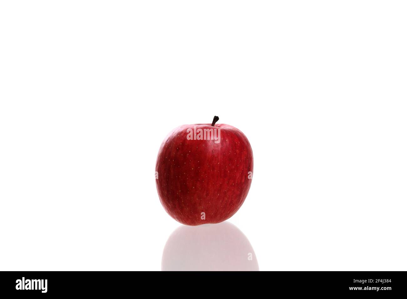 Japanese red apple isolated in white background Stock Photo - Alamy