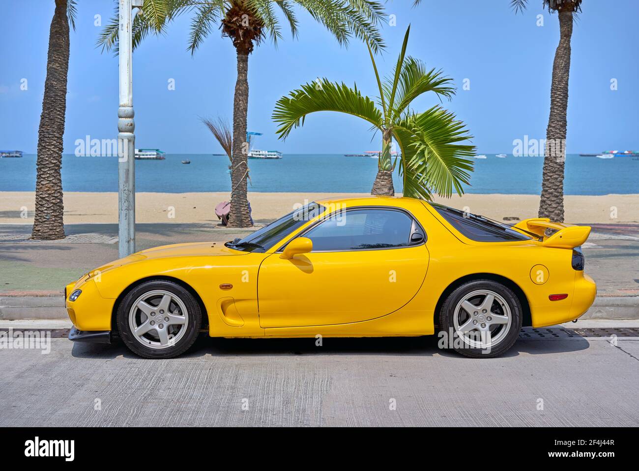 Mazda RX7 sports car in yellow Stock Photo - Alamy