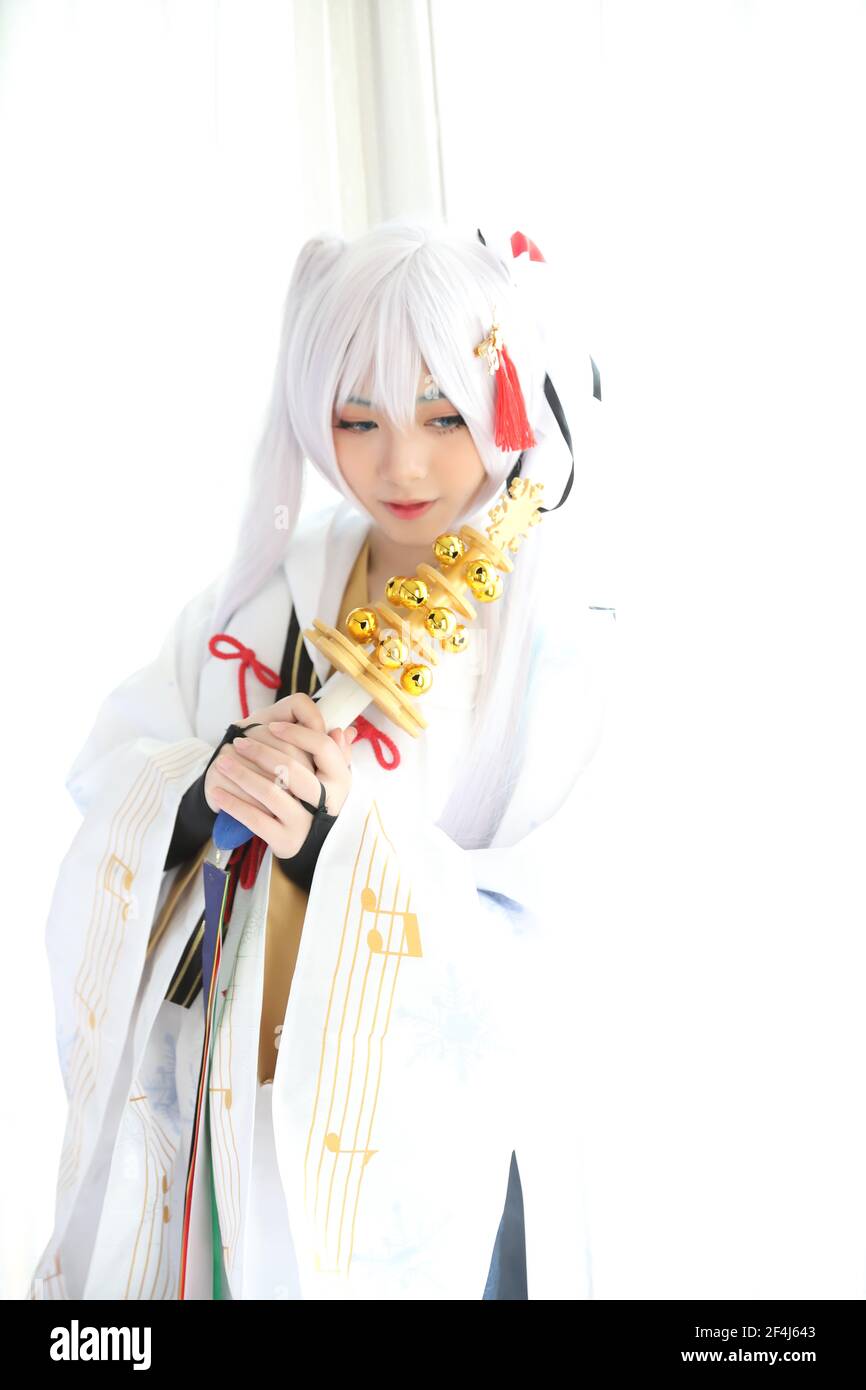 Japan anime cosplay in white tone room Stock Photo - Alamy