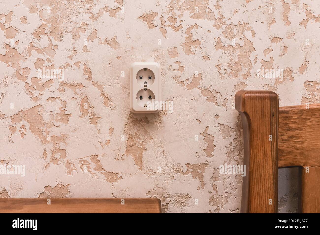 Double socket on a plaster wall in a modern room interior Stock Photo ...