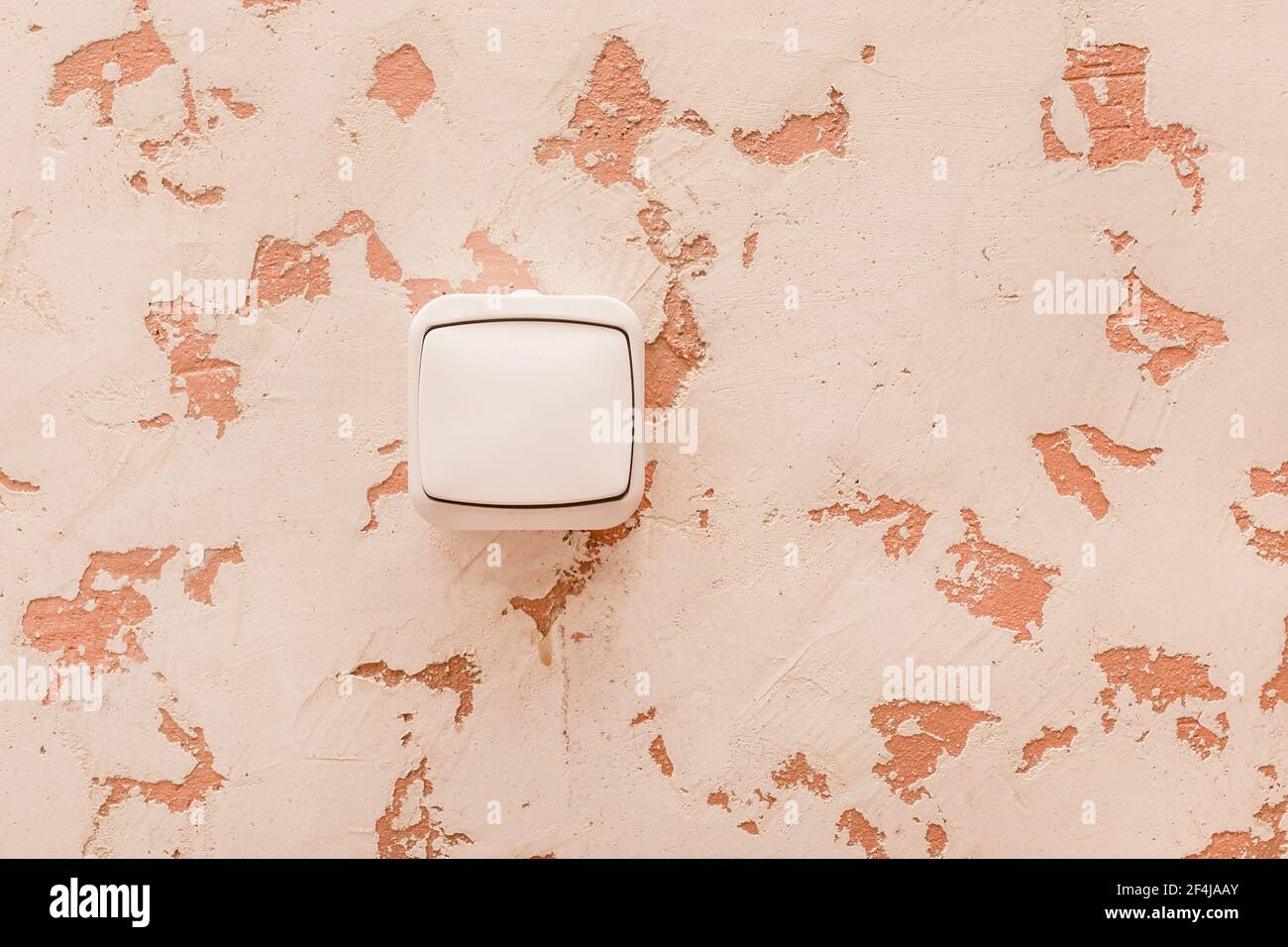 Electric switch on the wall in a modern room interior background Stock ...