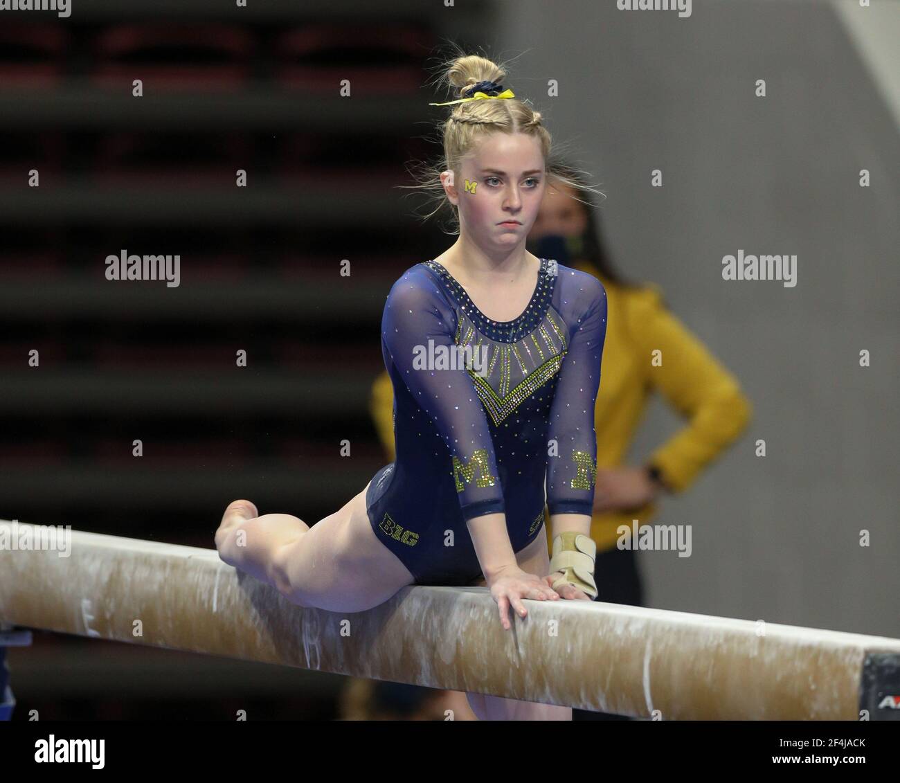 Minneapolis, MN, USA. 20th Mar, 2021. Michigan's Lauren Farley begins ...