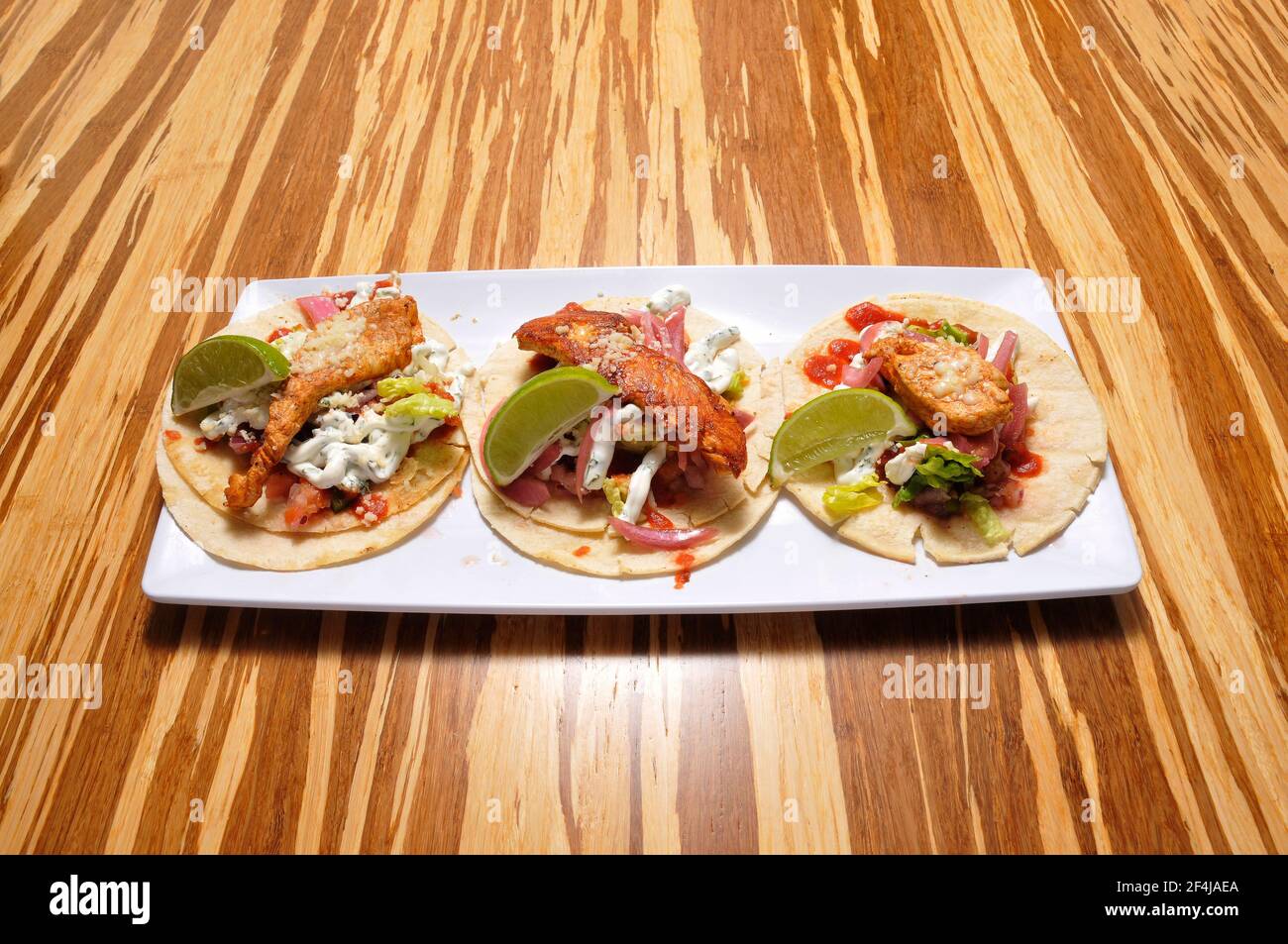 Authentic tex mex mexican cuisine known as a Chicken Taco Stock Photo ...