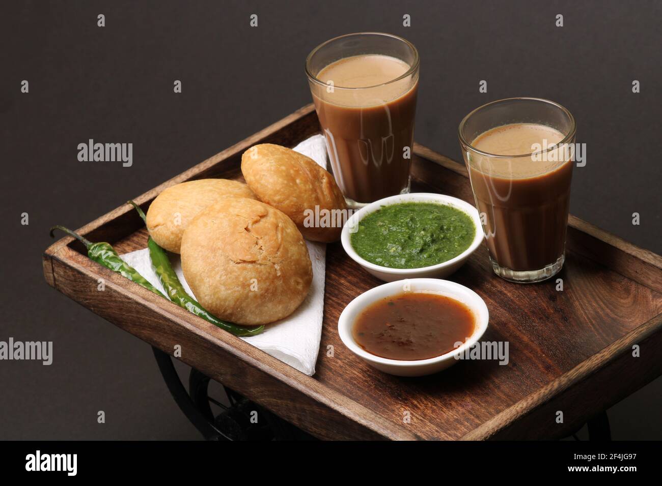 Indian snakes food kachouri or kachoudi kachori served with masala or ...