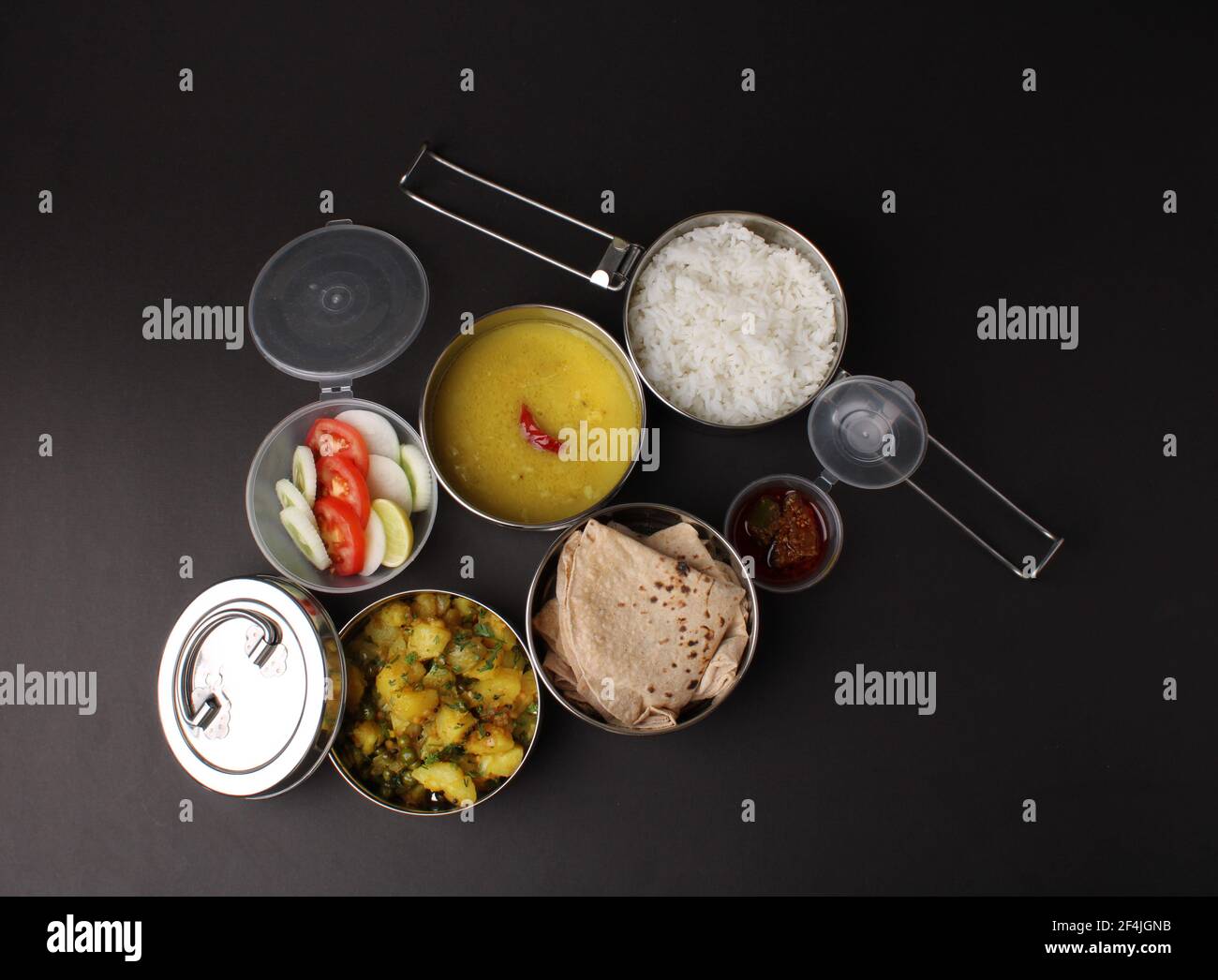 Typical Stainless steel Lunch Box or Tiffin with Maharashtrian food ...