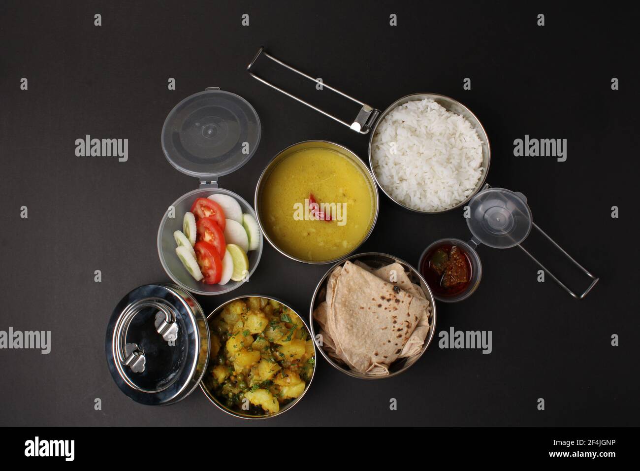Typical Stainless steel Lunch Box or Tiffin with Maharashtrian food ...