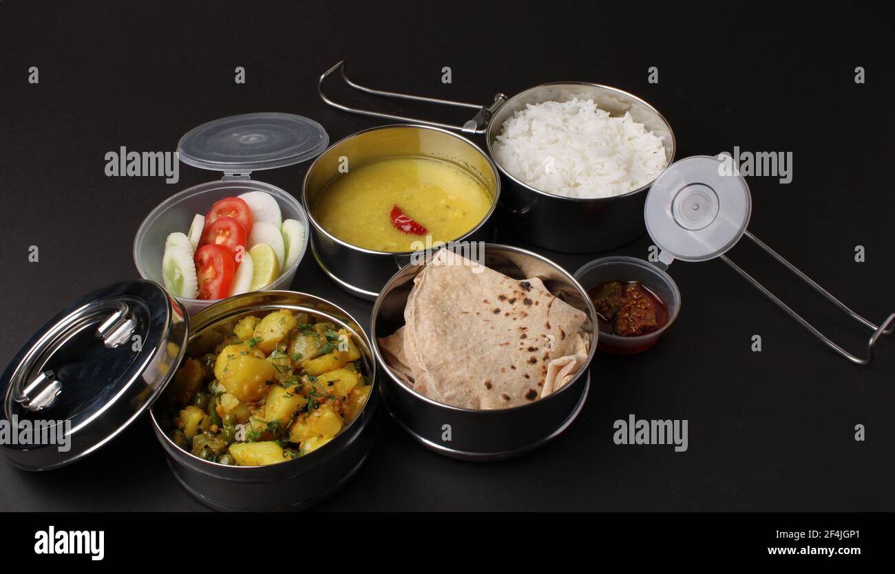Typical Stainless steel Lunch Box or Tiffin with Maharashtrian food ...