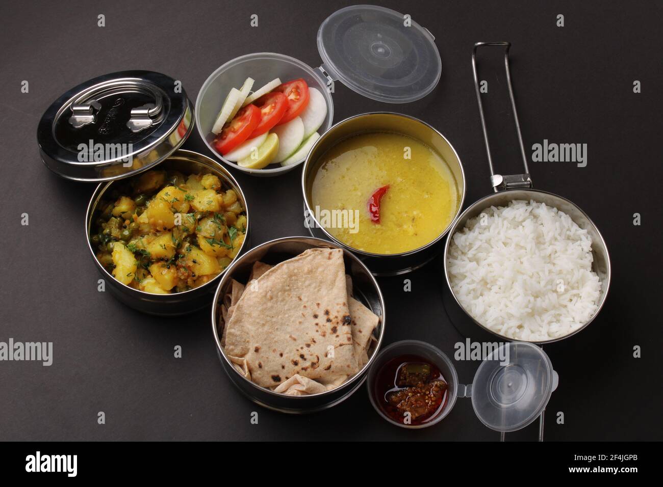 Typical Stainless steel Lunch Box or Tiffin with Maharashtrian food ...