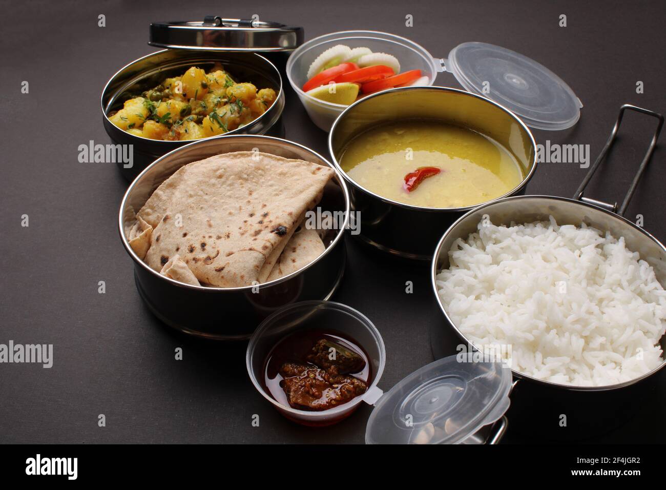 Typical Stainless steel Lunch Box or Tiffin with Maharashtrian food ...
