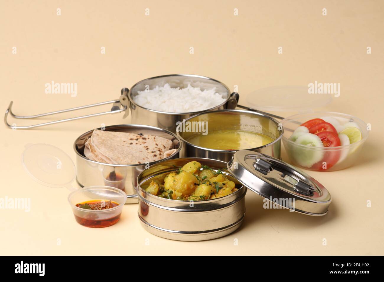 Typical Stainless steel Lunch Box or Tiffin with Maharashtrian food ...