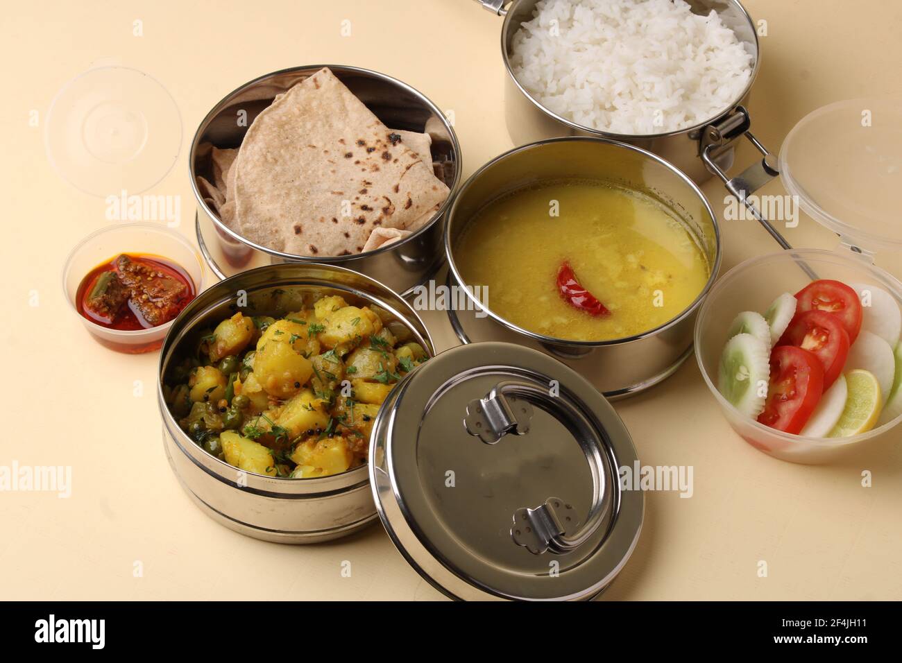 Typical Stainless steel Lunch Box or Tiffin with Maharashtrian food ...