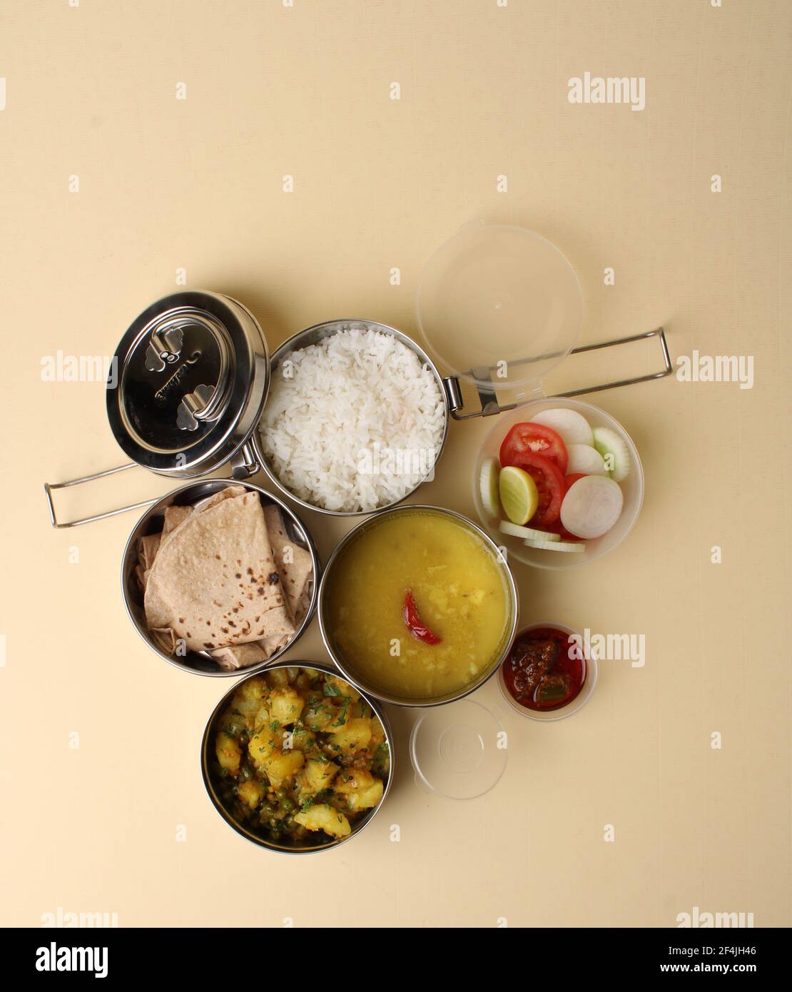 Typical Stainless steel Lunch Box or Tiffin with Maharashtrian food ...