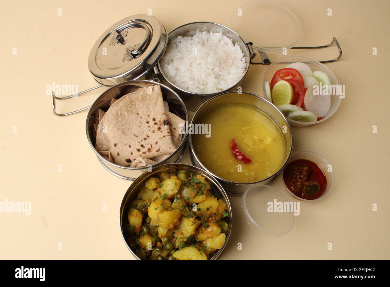 Typical Stainless steel Lunch Box or Tiffin with Maharashtrian food ...
