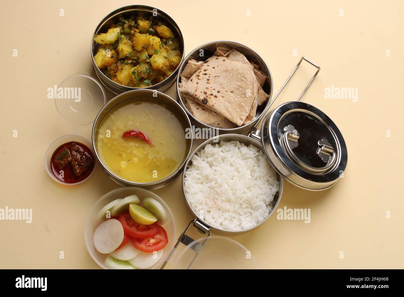 Typical Stainless steel Lunch Box or Tiffin with Maharashtrian food ...