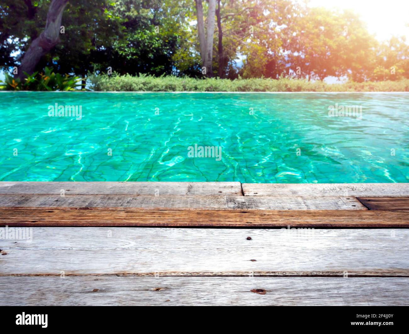 Old vintage style wood plank floor on poolside. Blank space on wooden ...