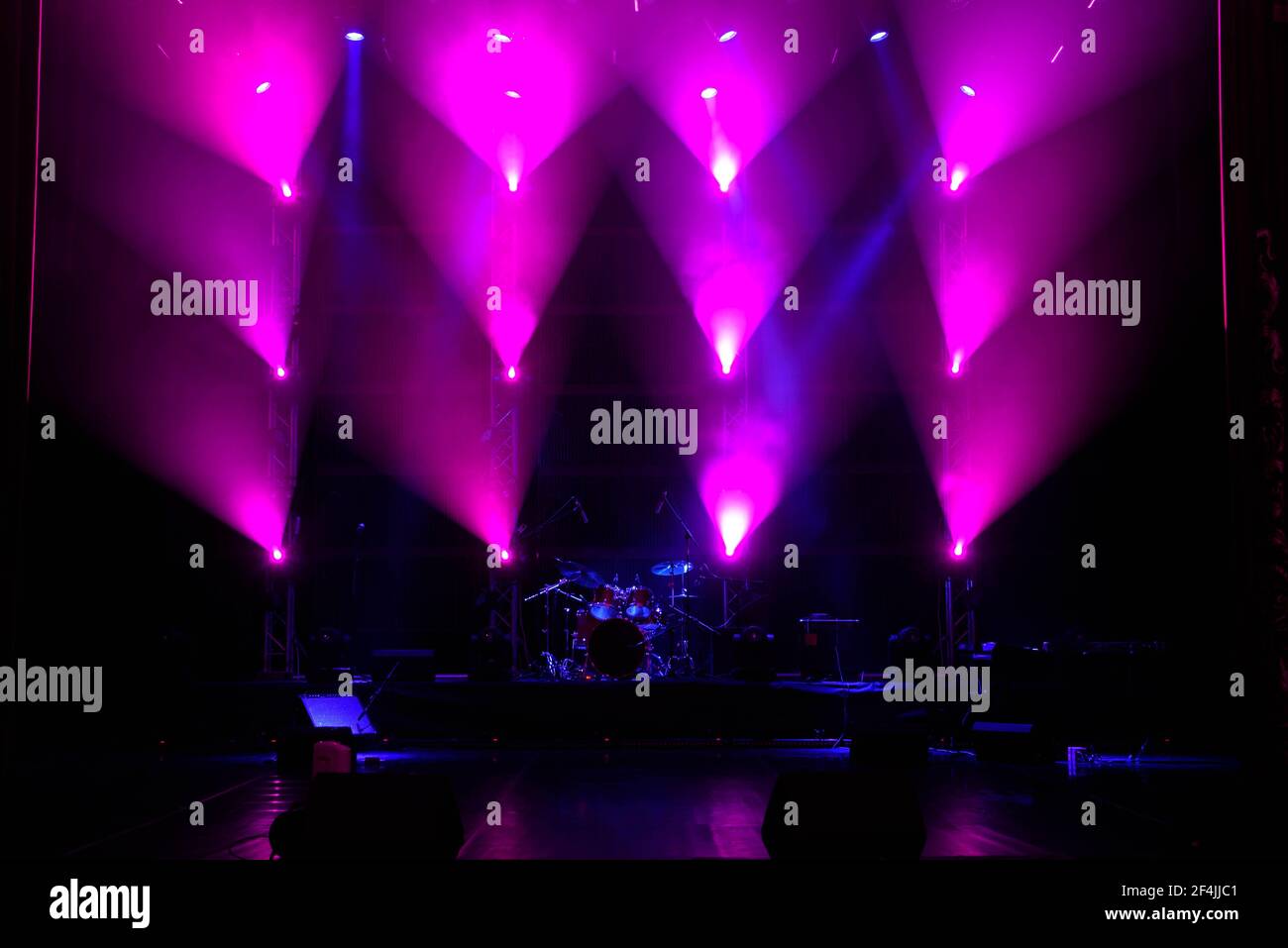 The light of searchlights in smoke on stage Stock Photo - Alamy
