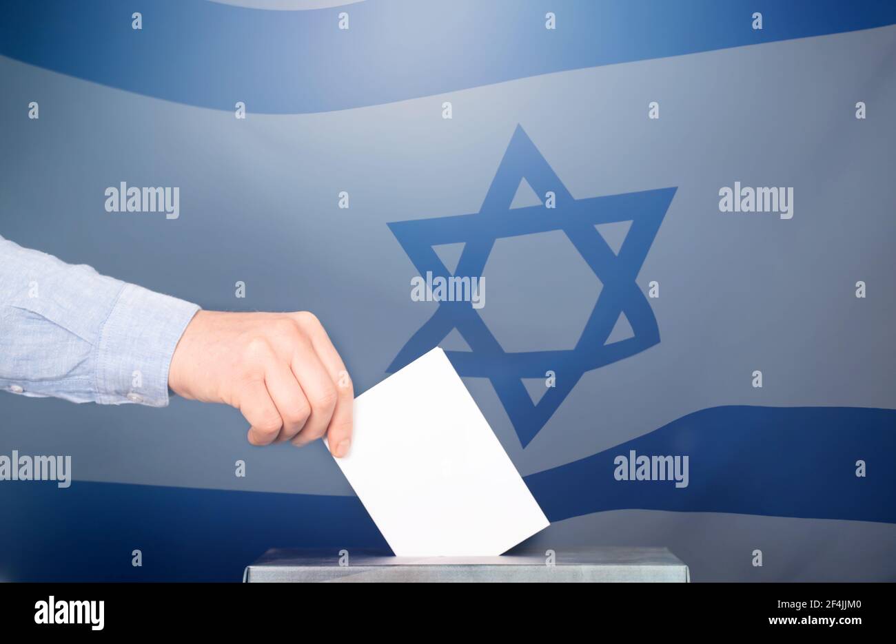 Election in Israel. Hand of voter putting vote in the ballot box. Waved ...