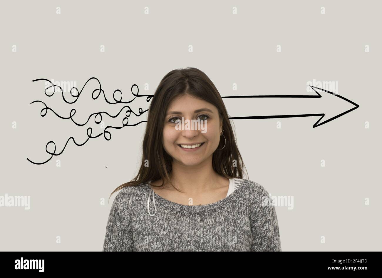 Smiling woman is thinking about process of problem solving. Scribbles ...