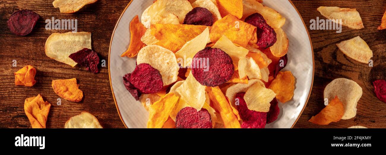Vegetable chips panorama, a flat lay shot of various crisps Stock Photo ...