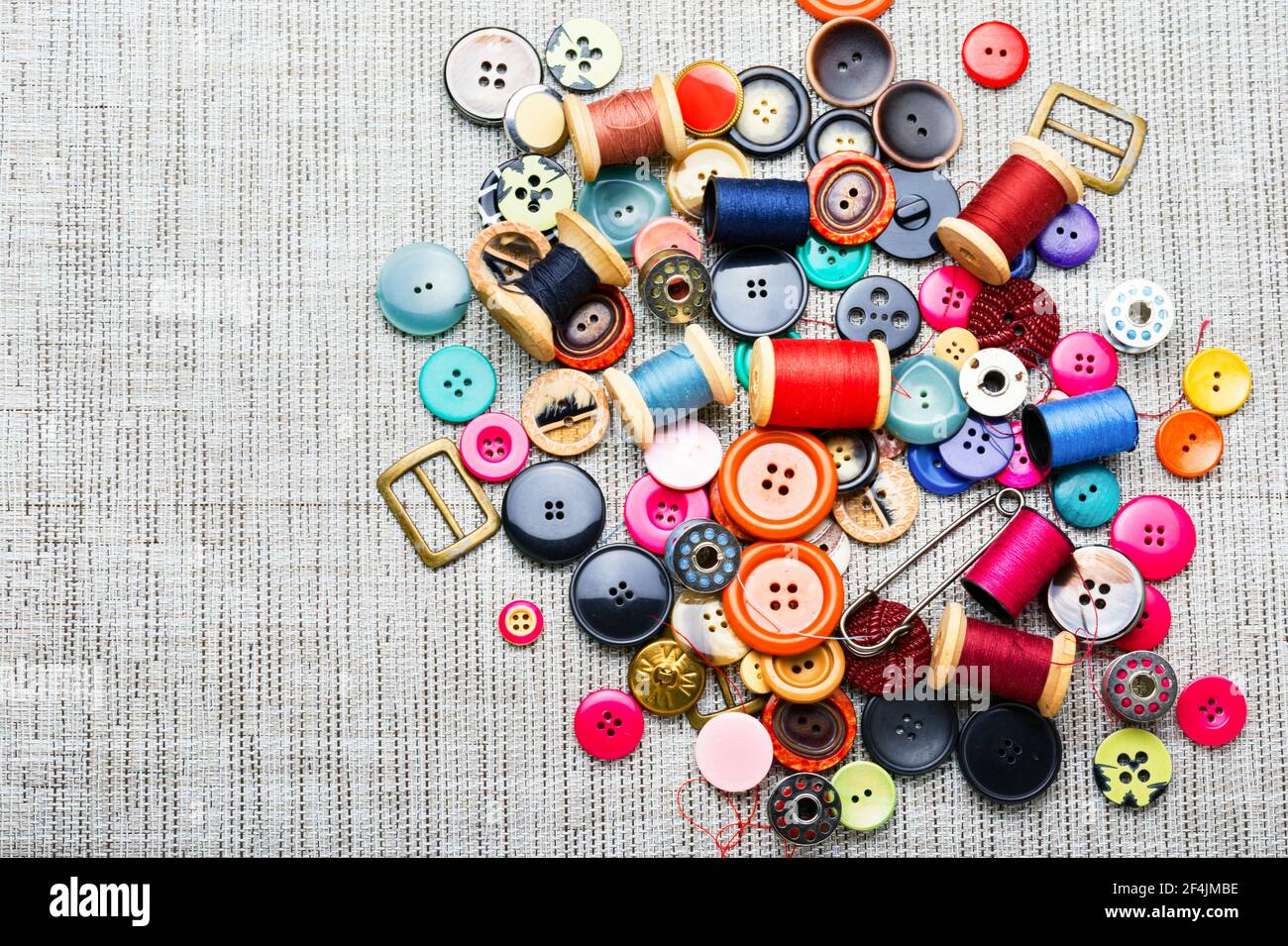 Set of buttons, threads and other sewing accessories.Tools for sewing ...