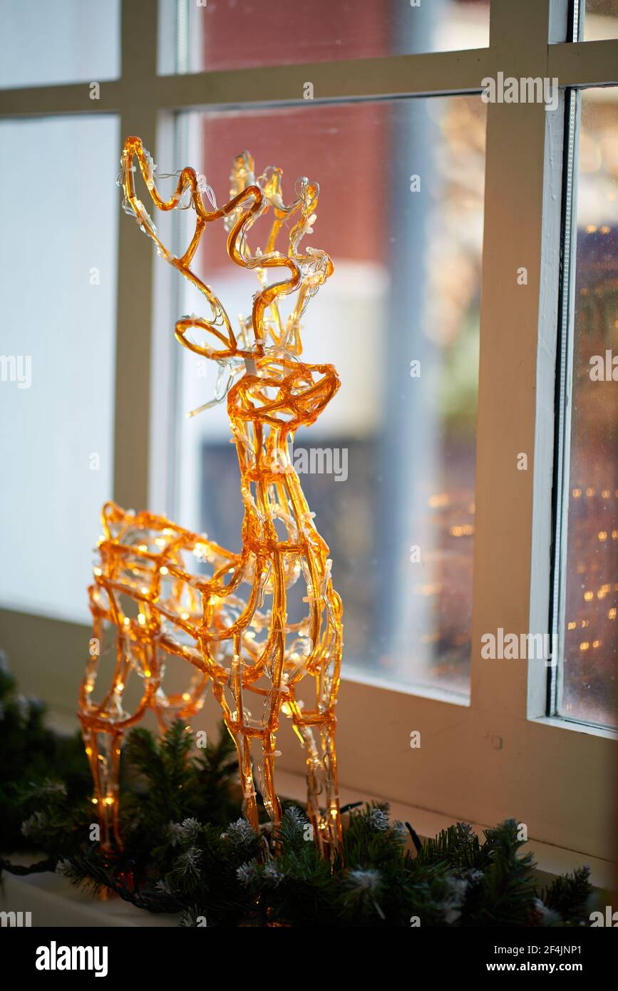 Christmas reindeer figure made from garland Stock Photo - Alamy