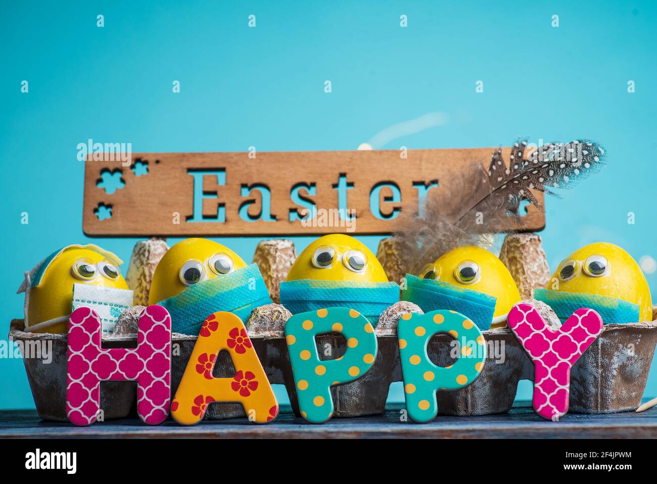 Happy Easter card with colorful hand Easter eggs wearing tiny surgical ...