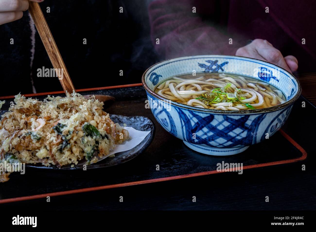 Ramen noodles japan hands hi-res stock photography and images - Alamy