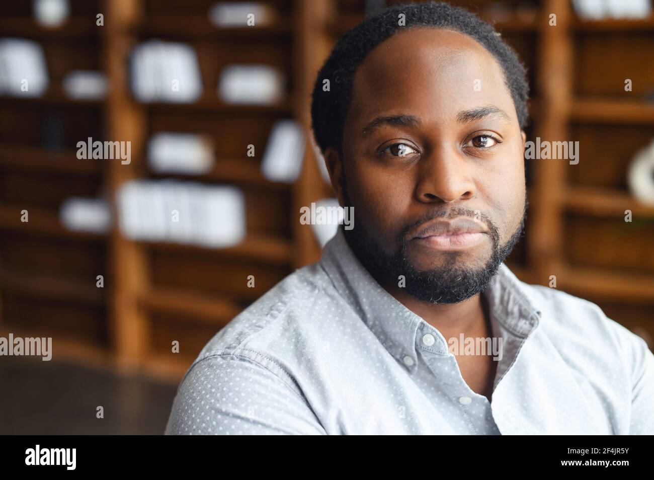 In library handsome african male hi-res stock photography and images ...