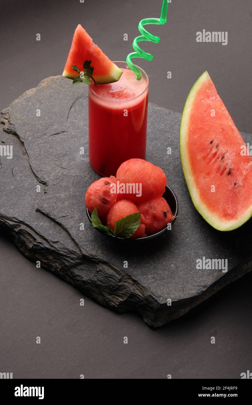 Watermelon smoothies or juice topping with fresh watermelon and mint ...