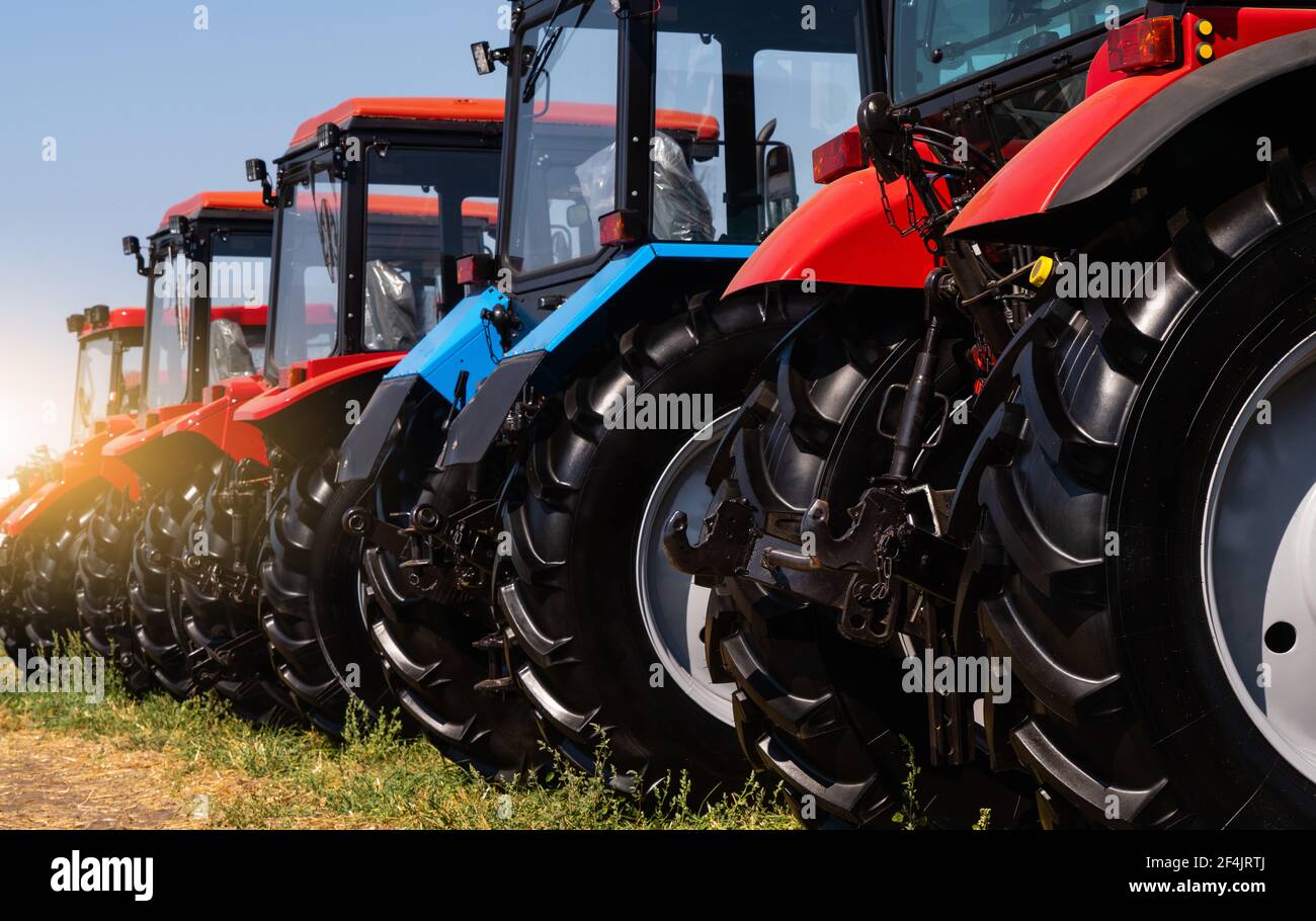 New agricultural tractors in stock Stock Photo - Alamy