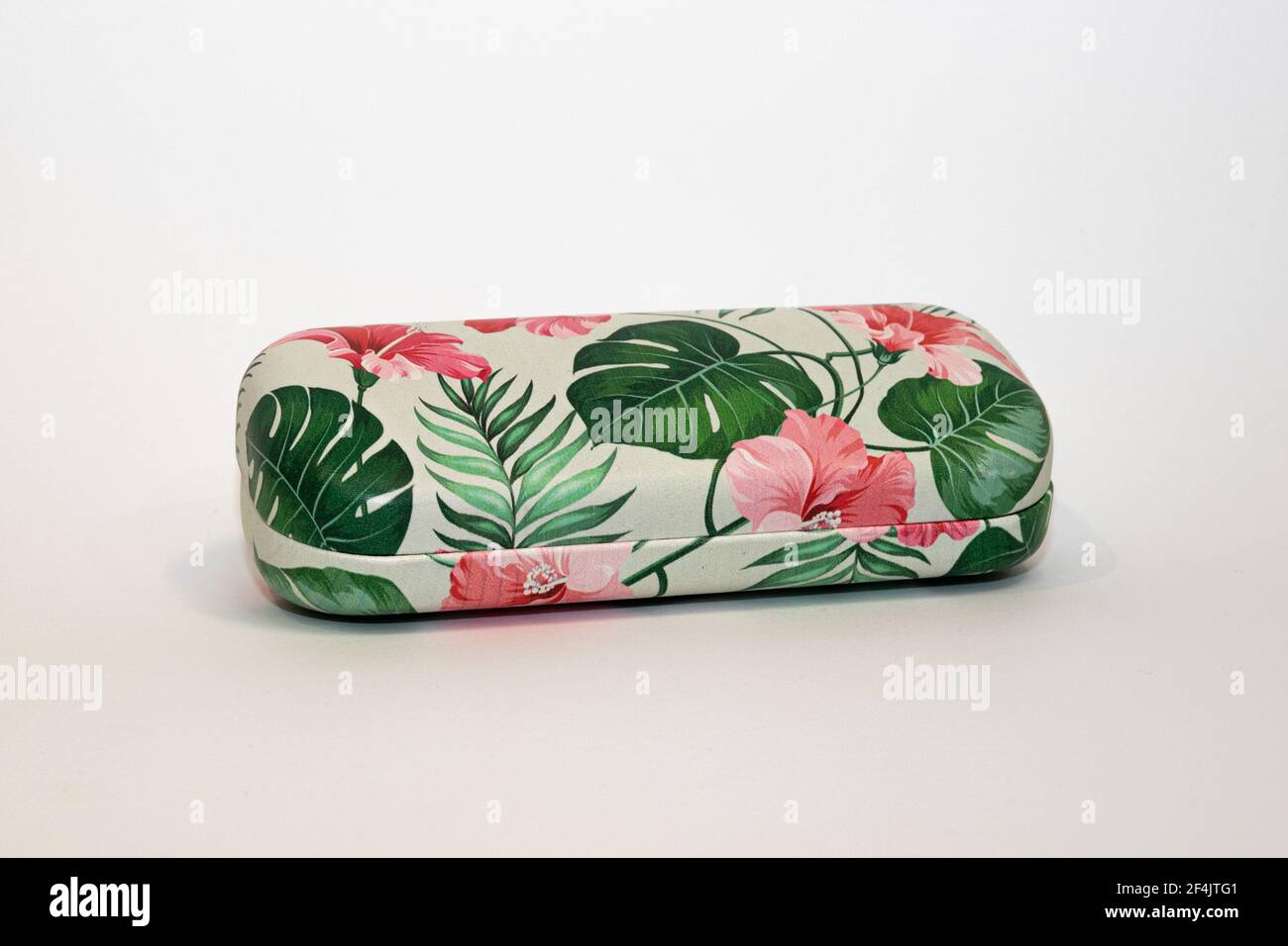 Closed glasses case with palm leaves and flowers print Stock Photo - Alamy