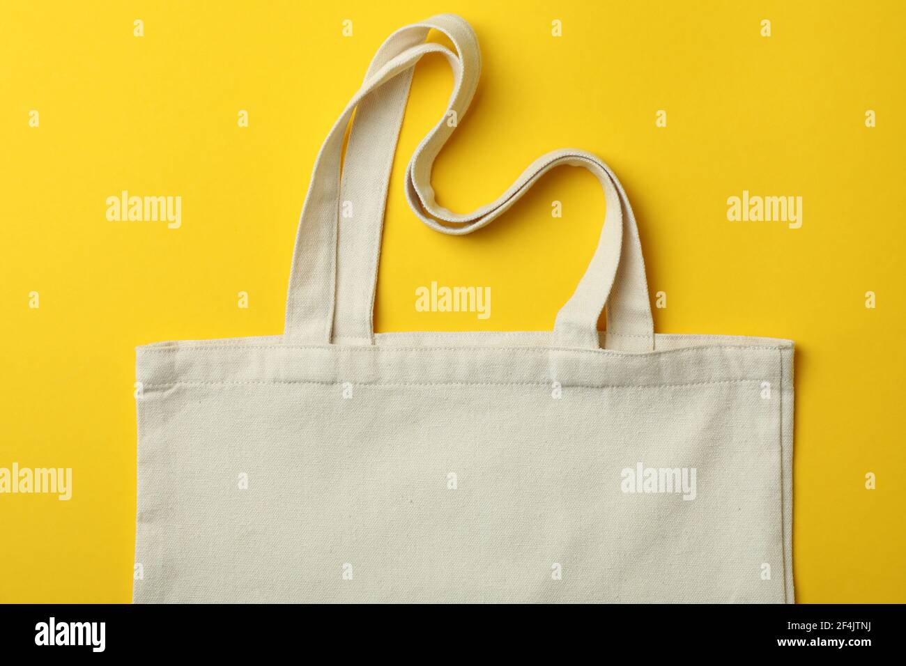 Blank eco bag on yellow background, space for text Stock Photo - Alamy