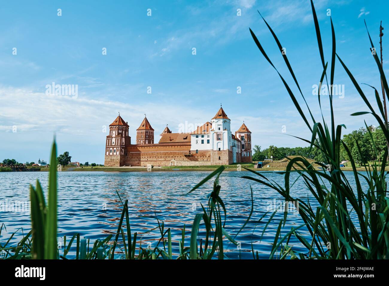 Mir castle complex in summer day with blue cloudy sky. Tourism landmark ...