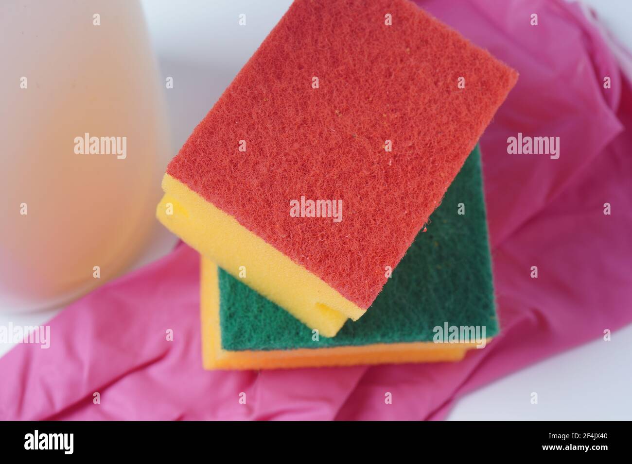 Sponges and rubber cloves for washing dishes and other domestic needs ...