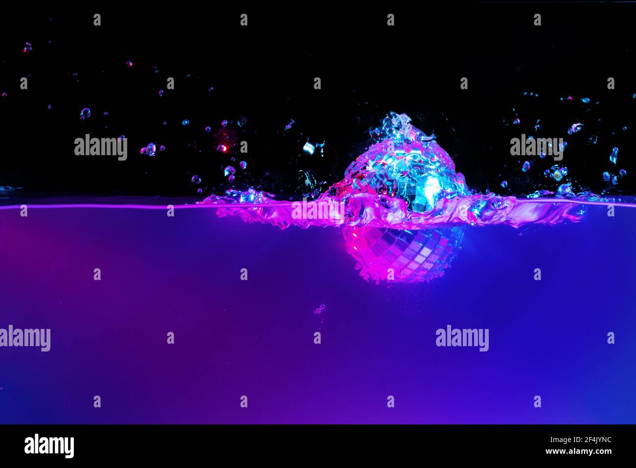 Disco ball falling water hi-res stock photography and images - Alamy