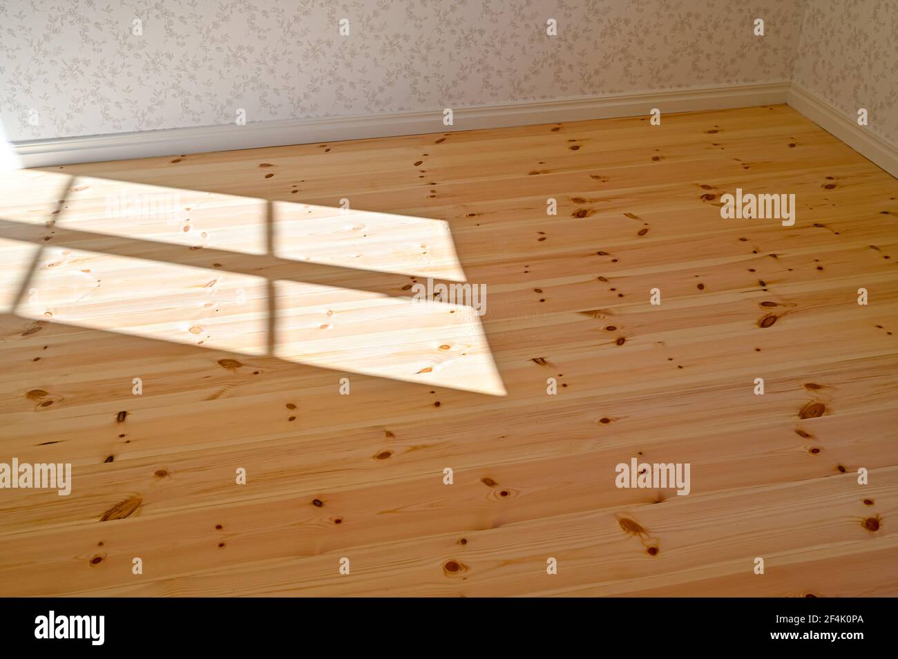 sunshine through window on wooden floor making shadows Stock Photo - Alamy