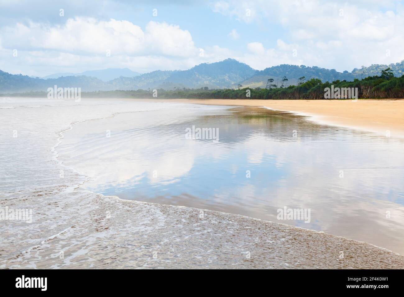 Red island beach ( pantai Pulau merah ) in Banyuwangi in Indonesia. Sky ...