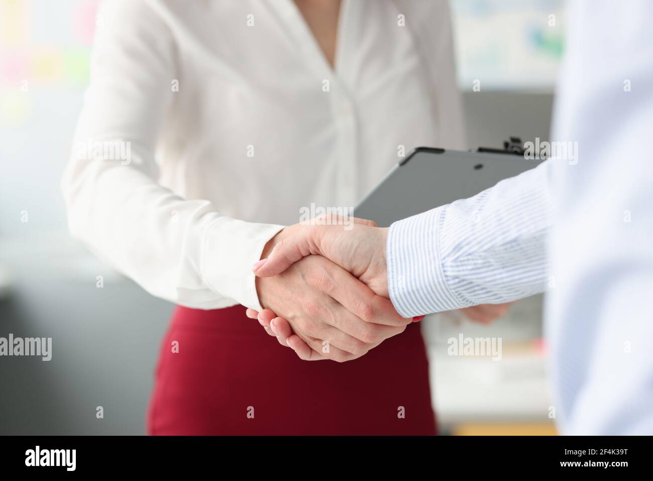 Business people shake hands in handshake closeup Stock Photo - Alamy