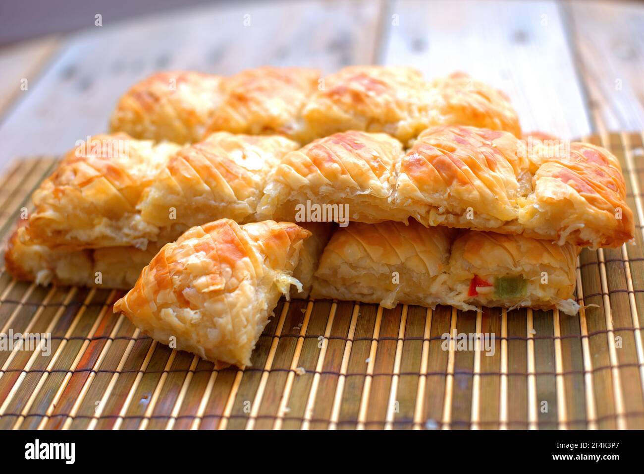 Whole homemade baked traditional Greek cheese pie Stock Photo - Alamy