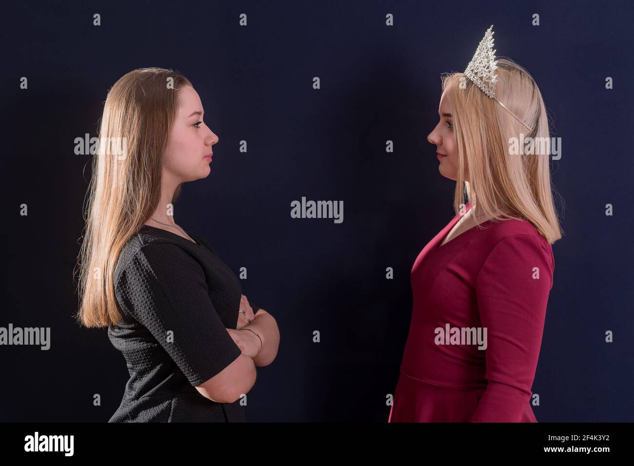 Two girls standing opposite hi-res stock photography and images - Alamy